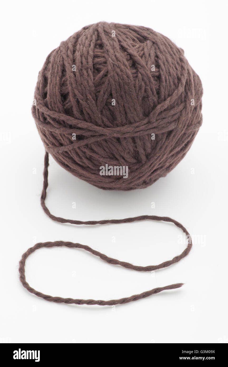 Ball of brown yarn Stock Photo - Alamy