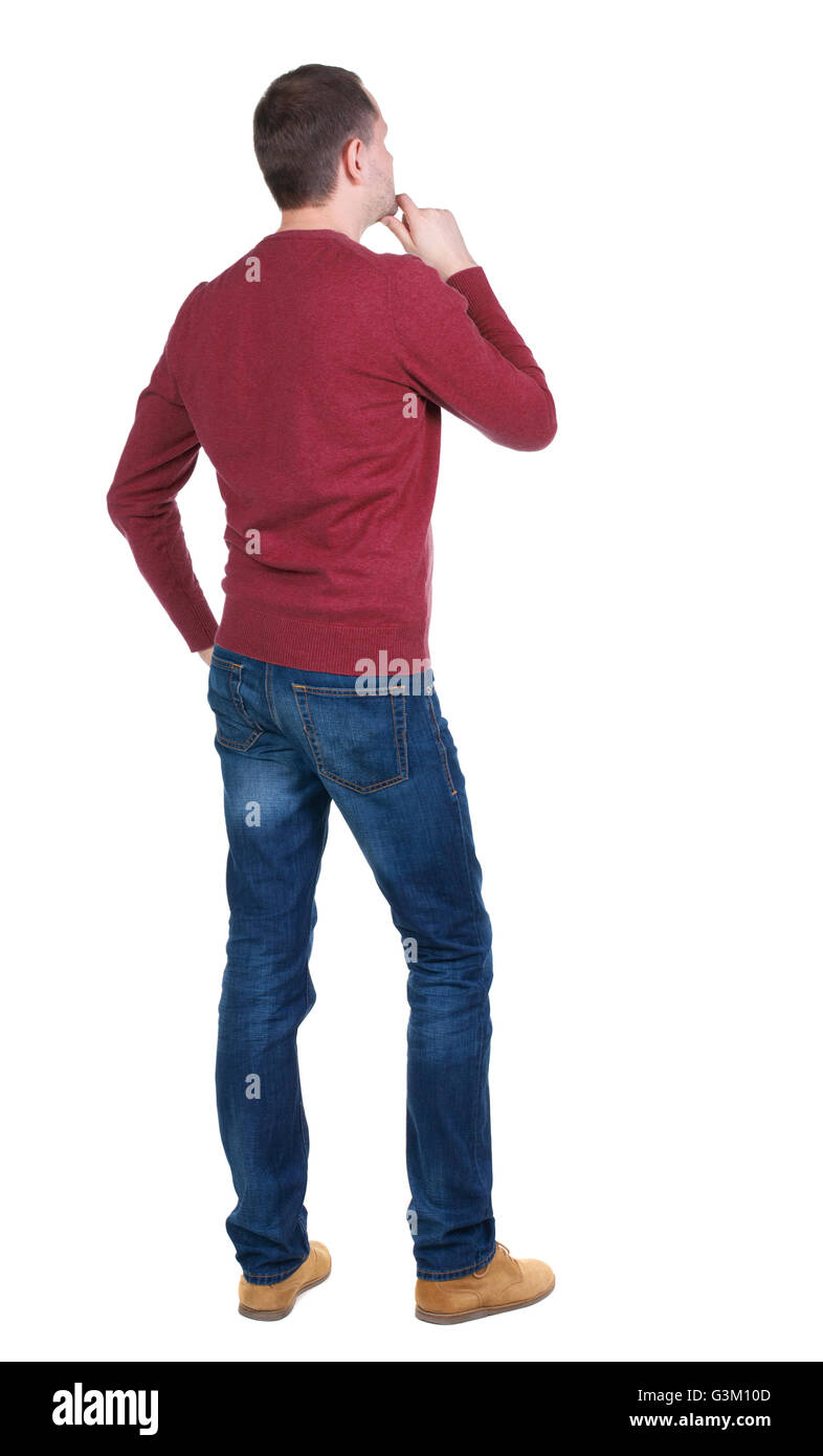 Back view of handsome man in blue pullover. Standing young guy in ...