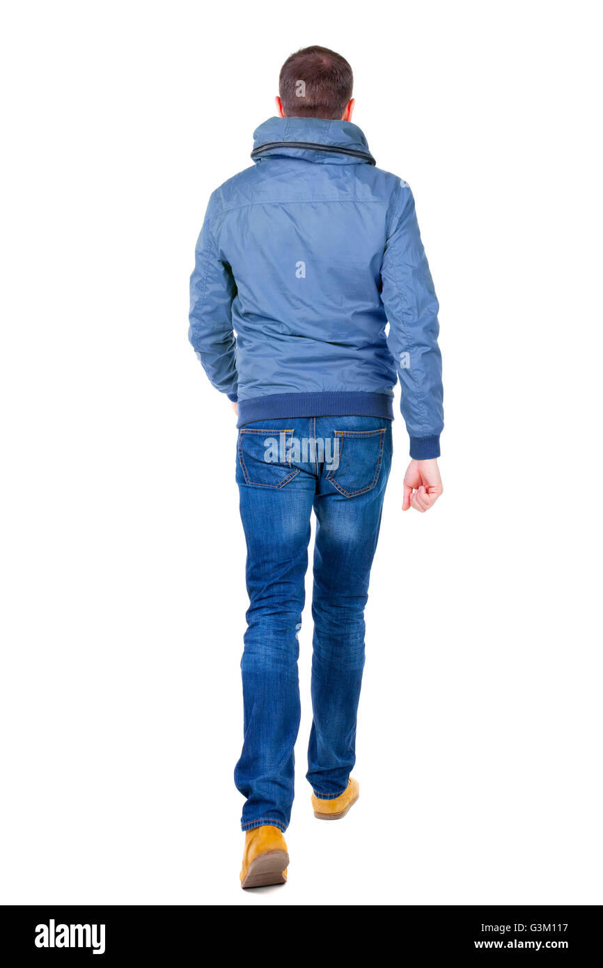 Back view of going handsome man in jeans and jacket. walking young guy ...