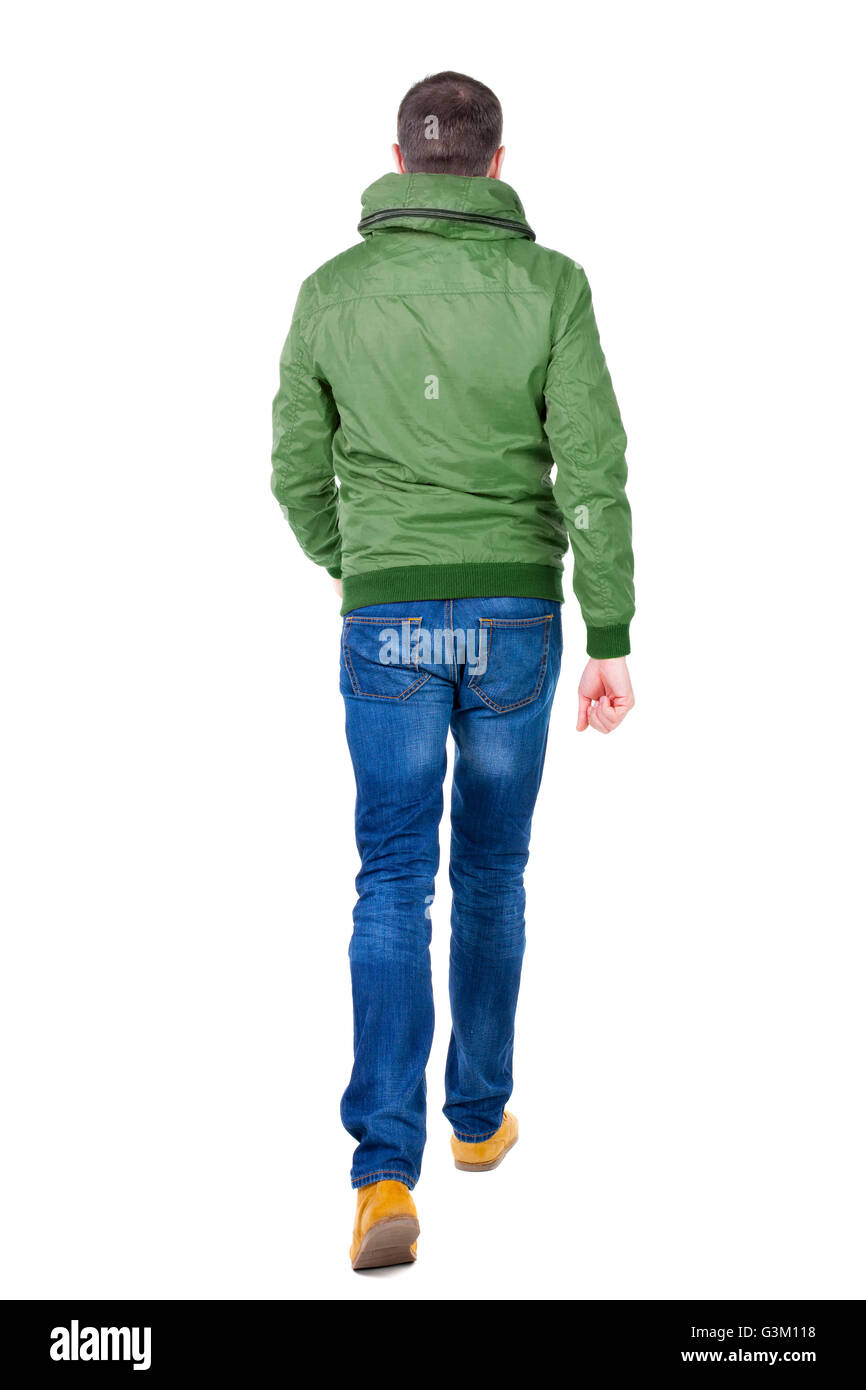 Back view of going handsome man in jeans and jacket. walking young guy ...