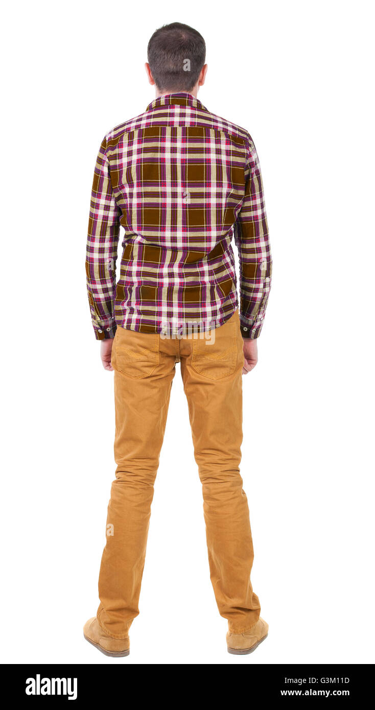 Back view of handsome man in checkered shirt looking up. Standing young ...