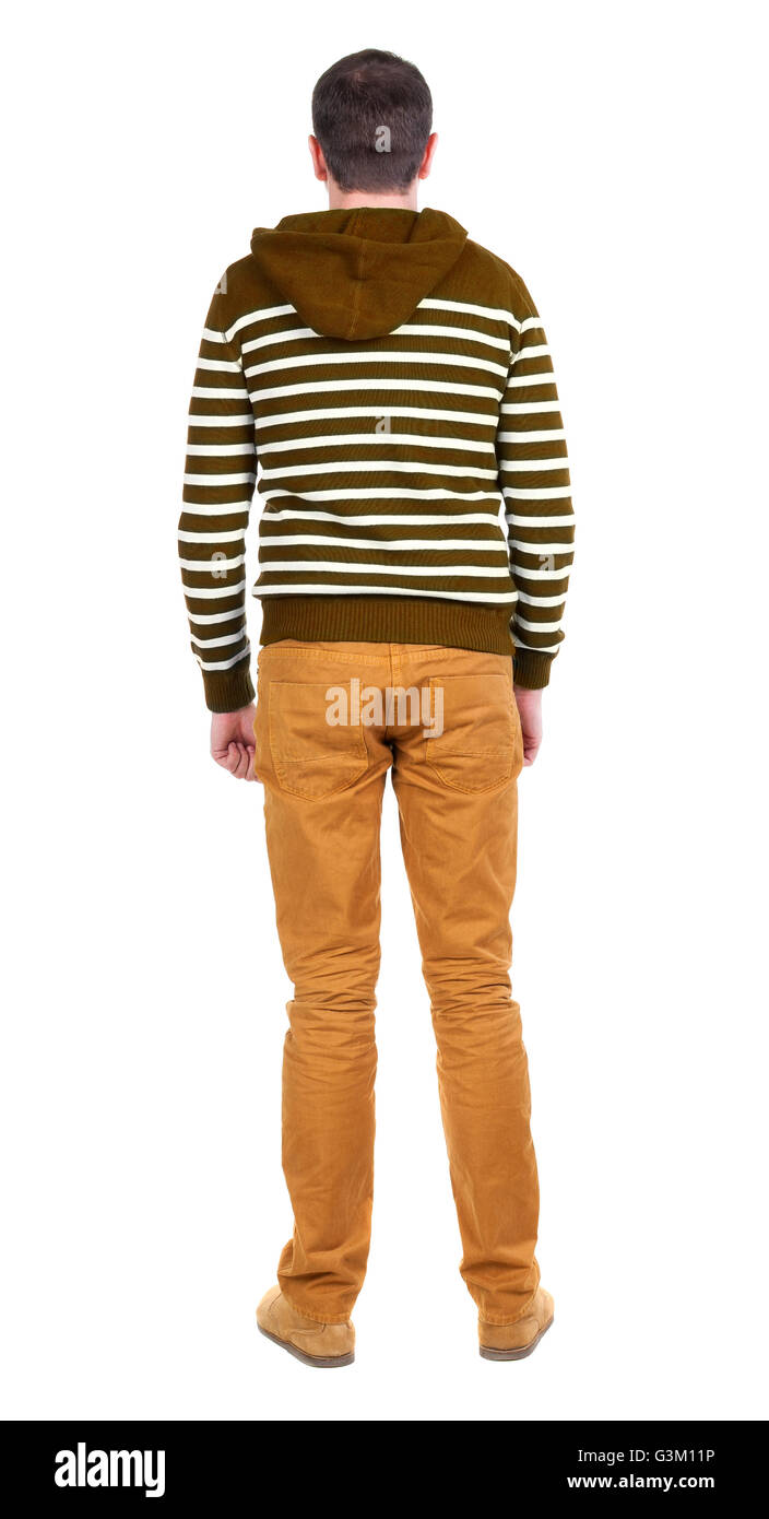 Back view of handsome man in striped hooded sweater. Standing young guy ...