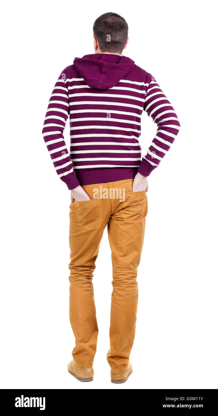 Back view of handsome man in striped hooded sweater. Standing young guy ...