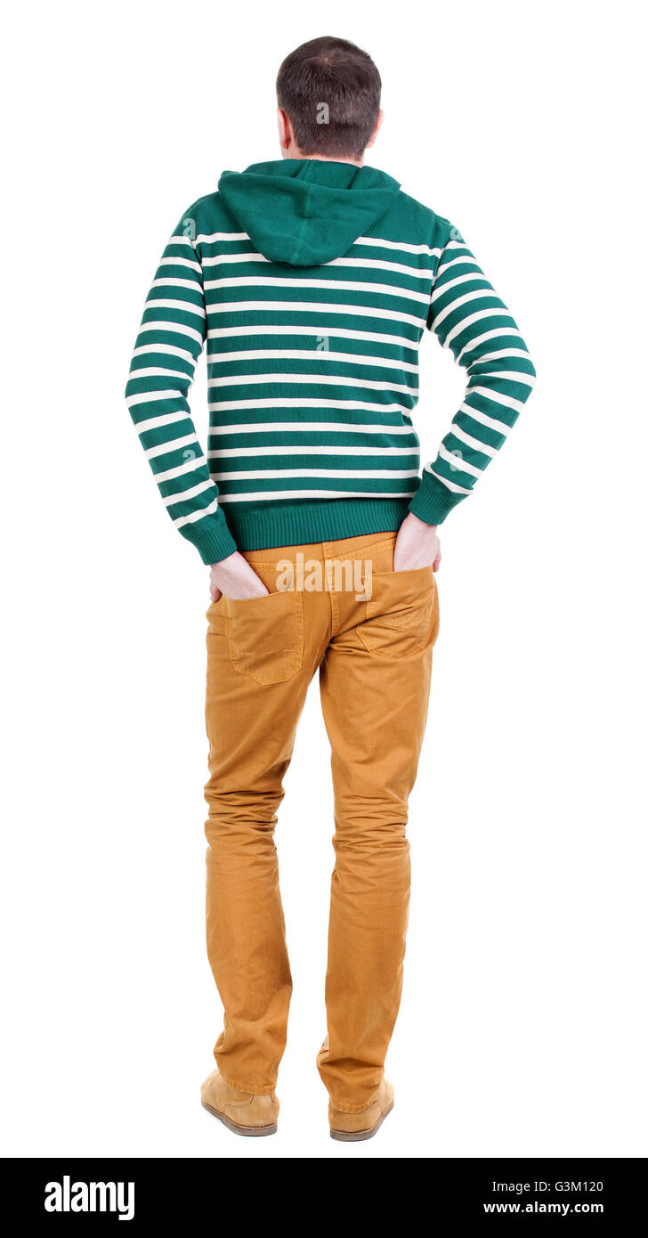 Back view of handsome man in striped hooded sweater. Standing young guy ...