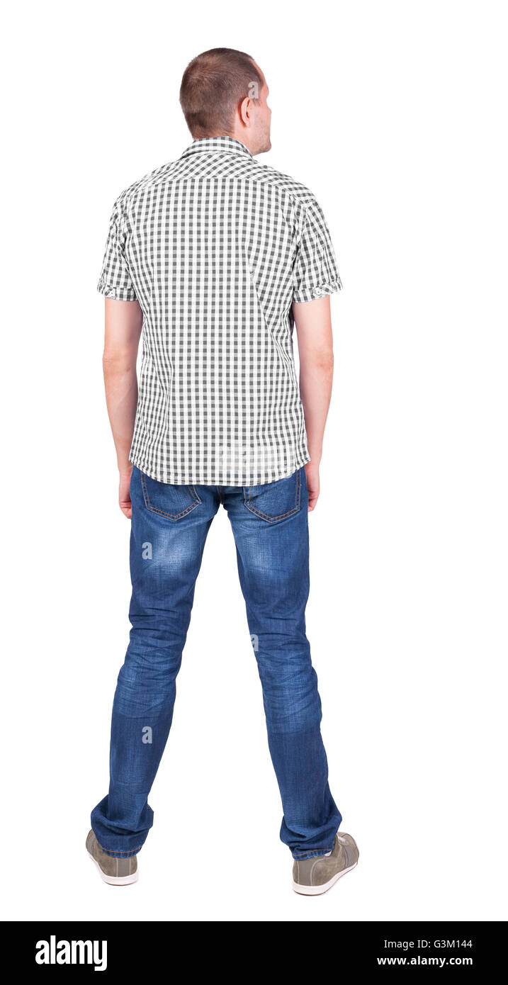 Back view of handsome man in shirt looking up. Standing young guy in ...