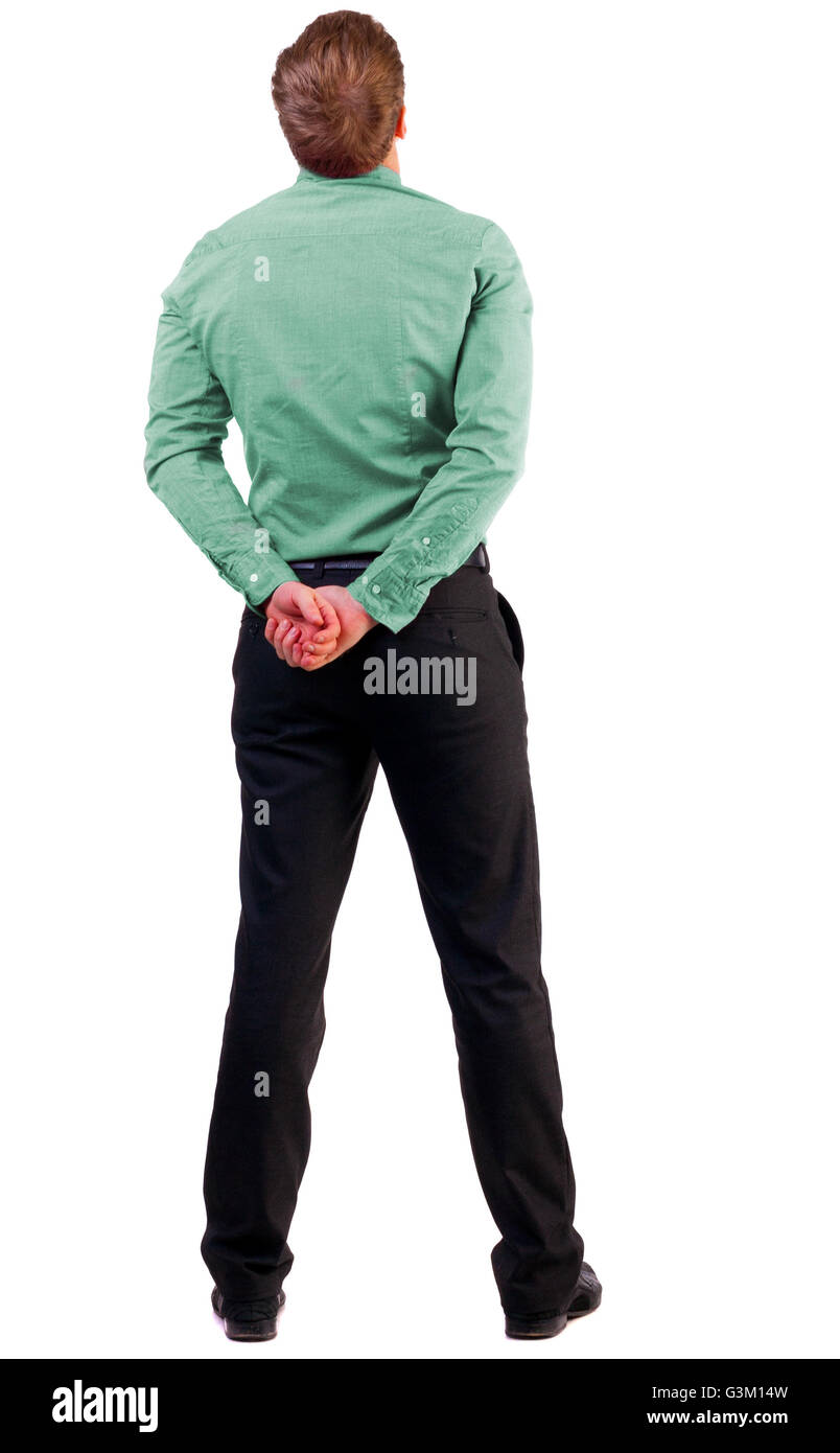 back view of Business man looks ahead. Young guy in pink shirt watching ...