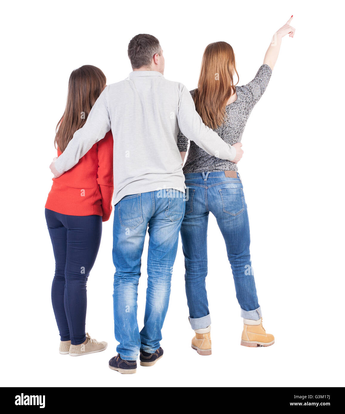 Back view of three friends pointing. group of people watching somewhere ...