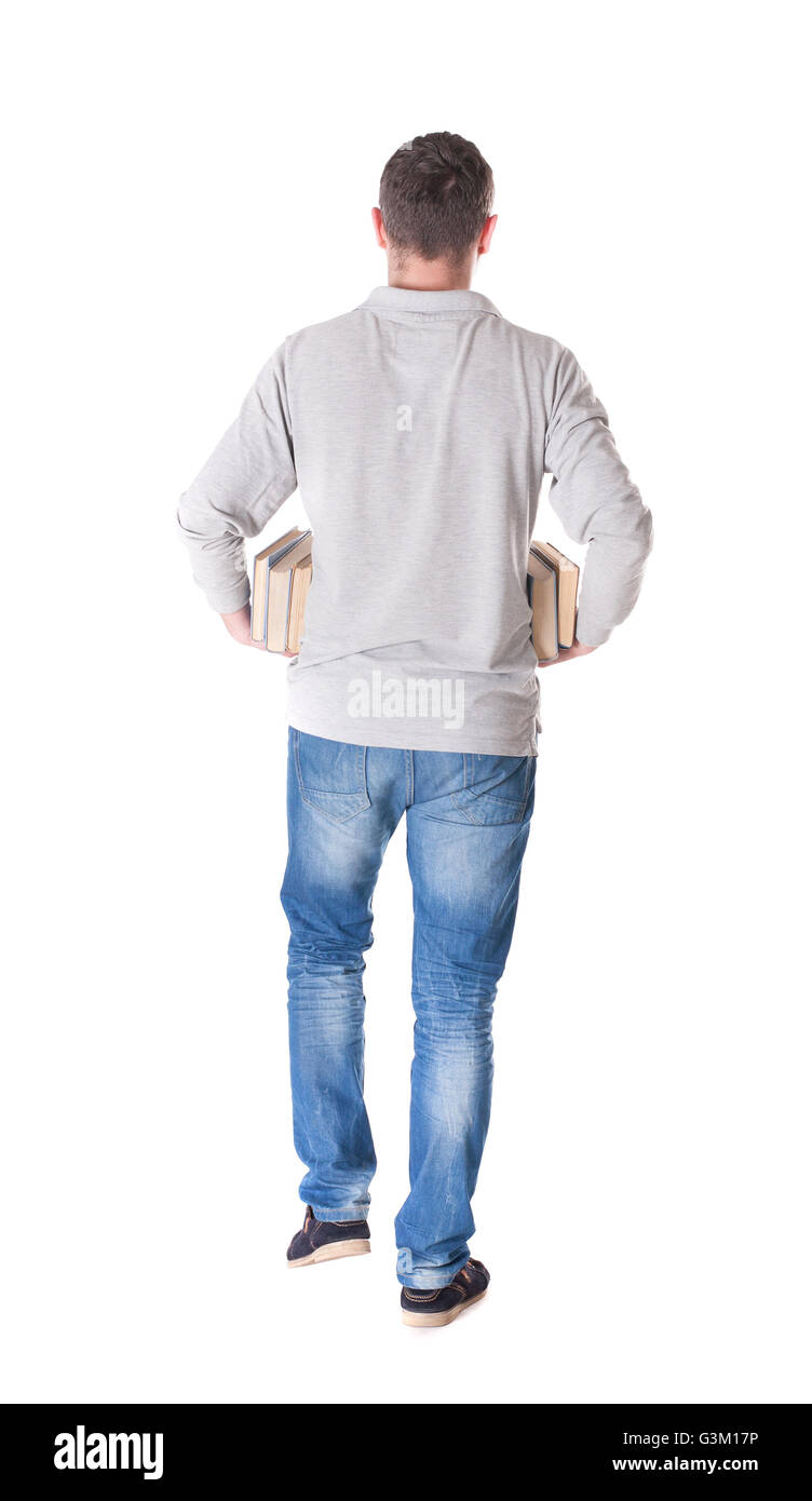 man goes and has a stack of books. back view. Rear view people ...