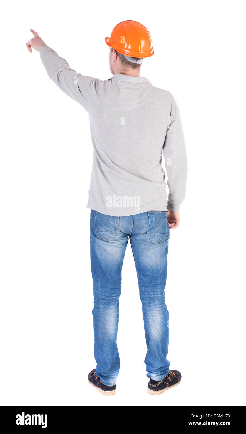 Back view of pointing young men in shirt and helmet. Young guy gesture ...