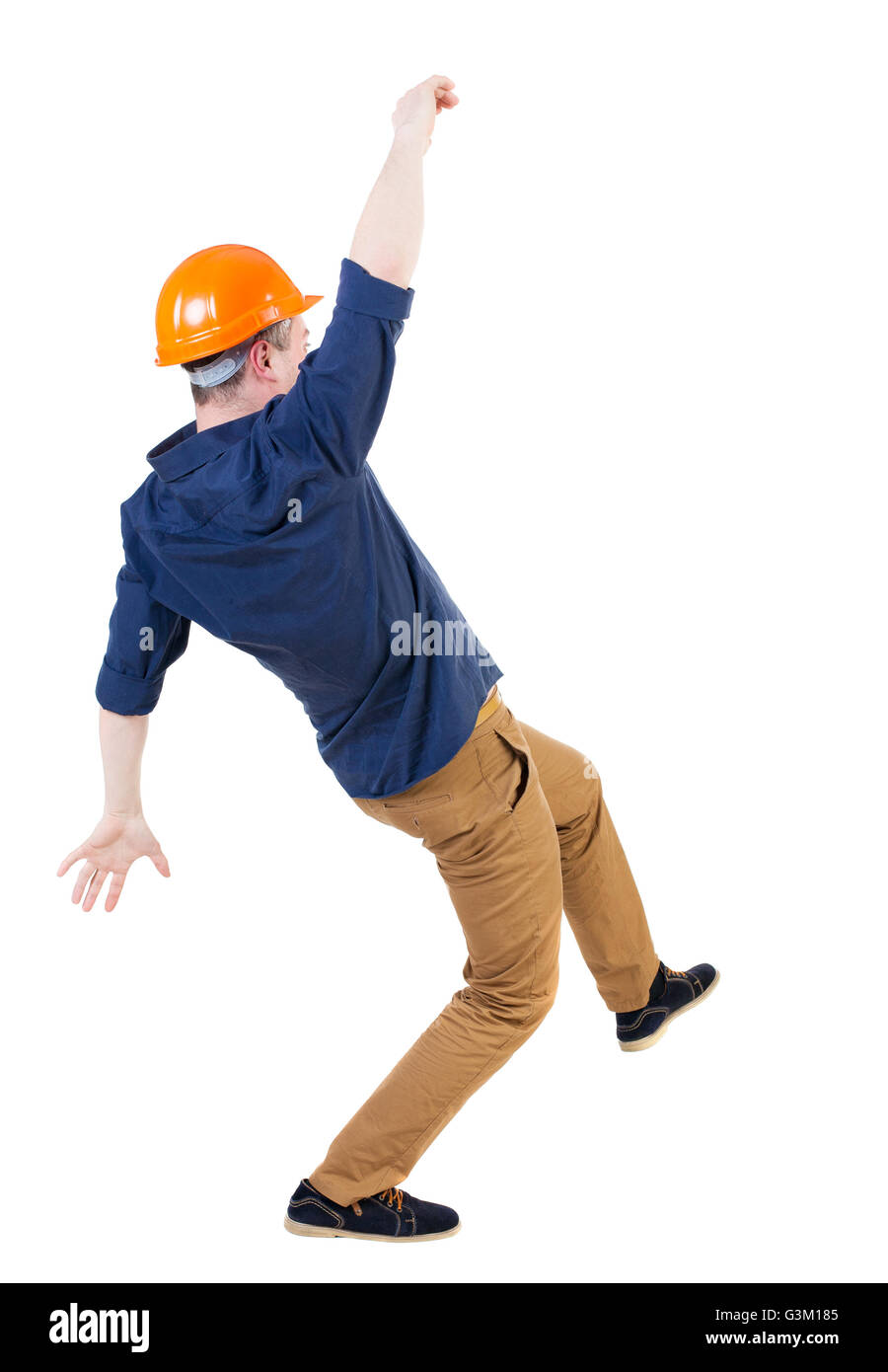 Balancing young man. or dodge the falling man. worker in construction ...