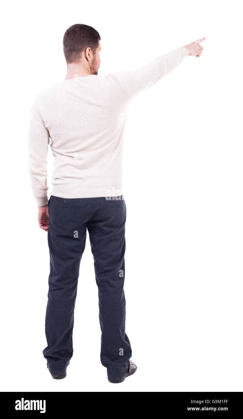 Back view of pointing business man. gesticulating young guy in black ...