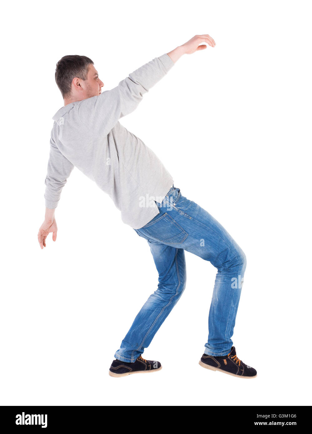 Back view man Balances waving his arms. Rear view people collection ...