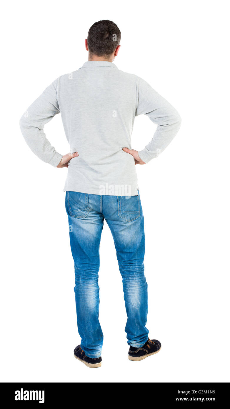 Back view of man in jeans. Standing young guy. Rear view people ...