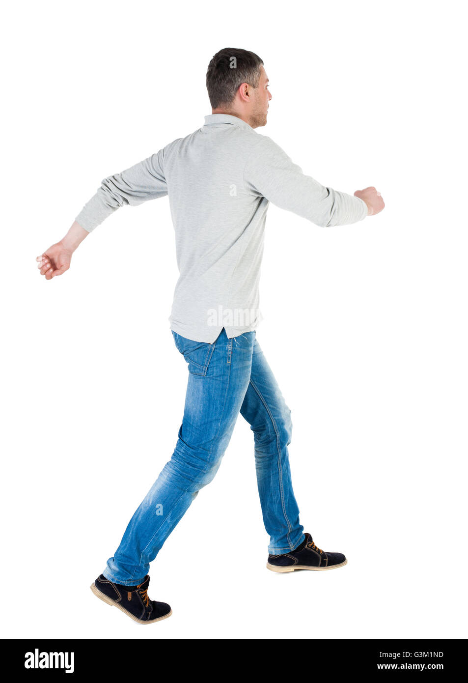 Back view of going handsome man in jeans and a shirt. walking young guy ...