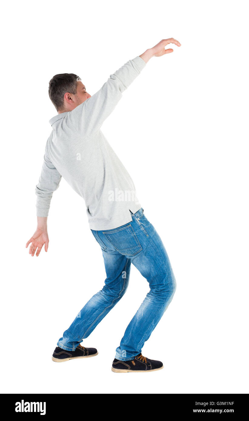 Back view man Balances waving his arms. Rear view people collection ...