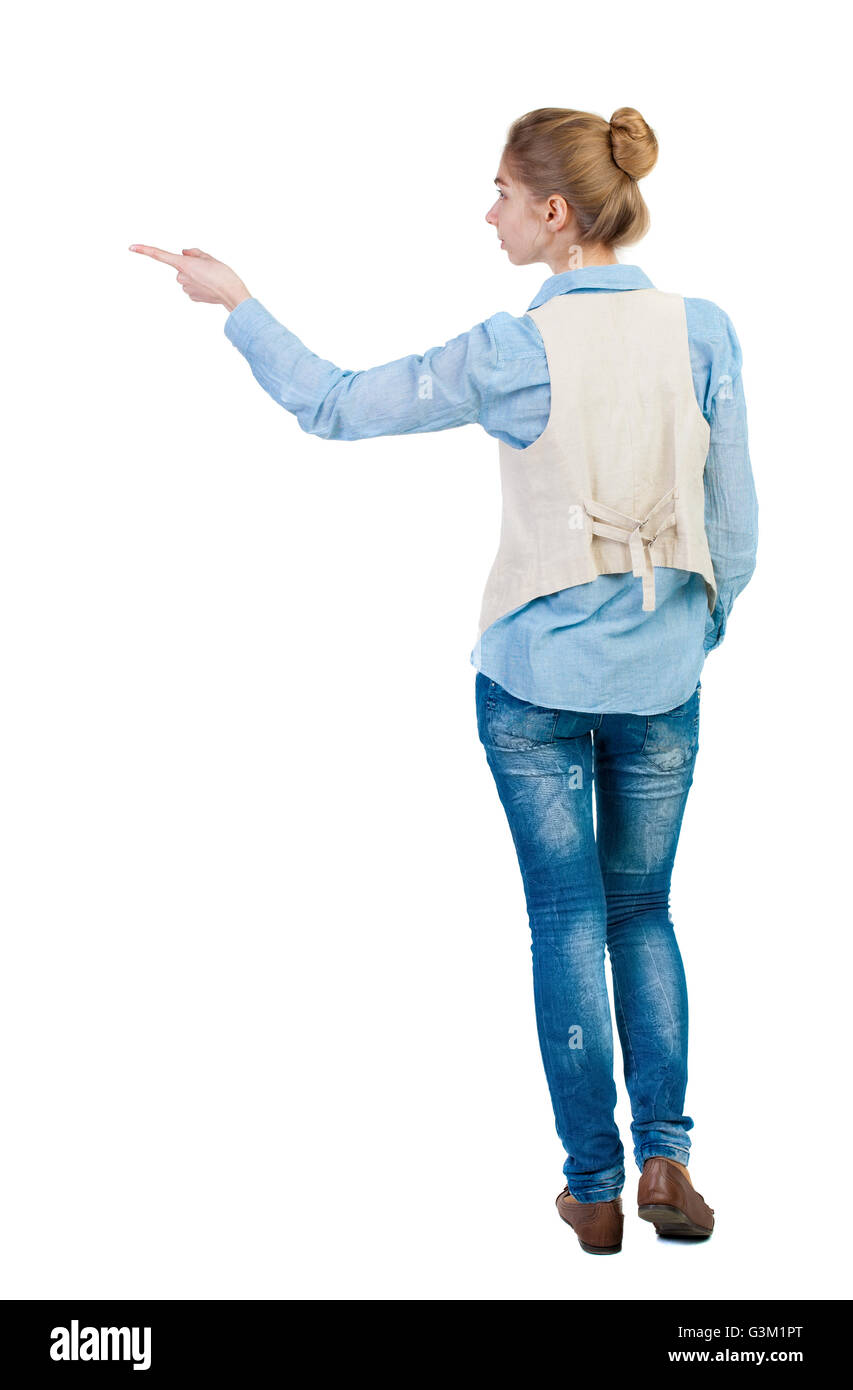Back view of pointing woman. beautiful girl. Rear view people ...