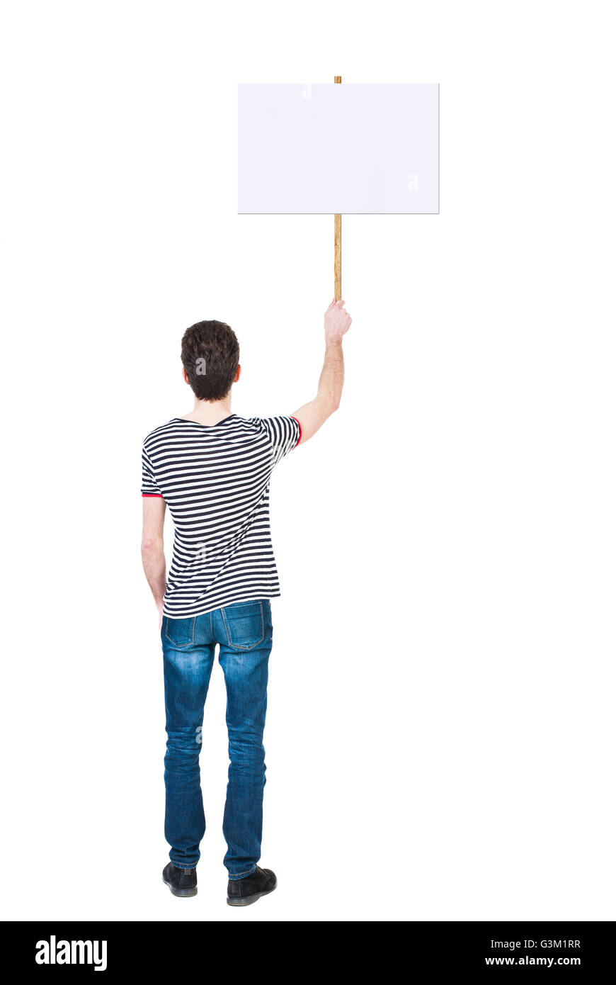 Back view man showing sign board. man holds information plate. Rear ...