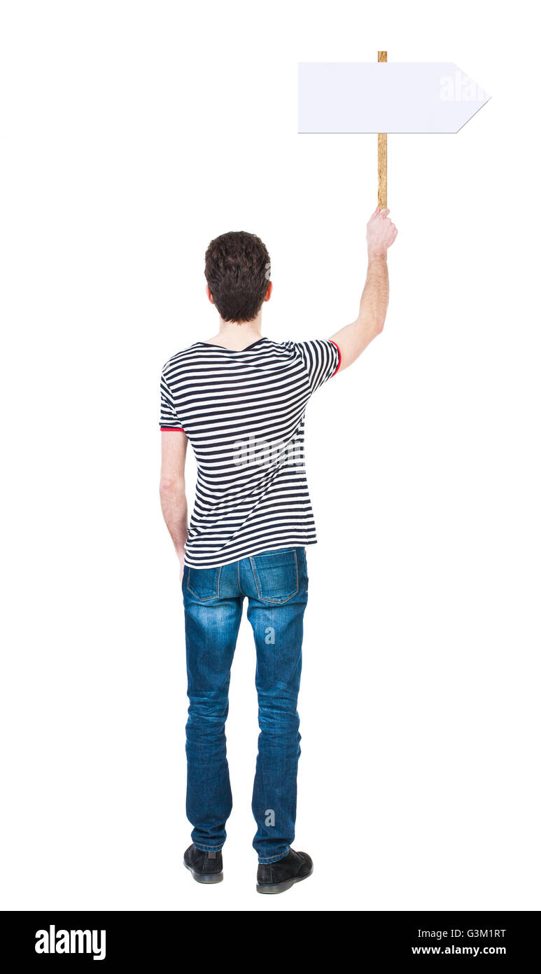 Back view man showing sign board. man holds information plate. Rear ...
