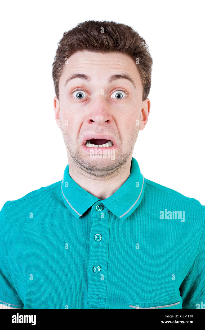 Scared or disgusted man in a blue sweater. Isolated on white background ...