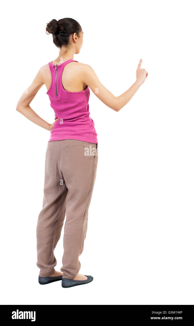 back view of woman. Young woman presses down on something. Isolated ...