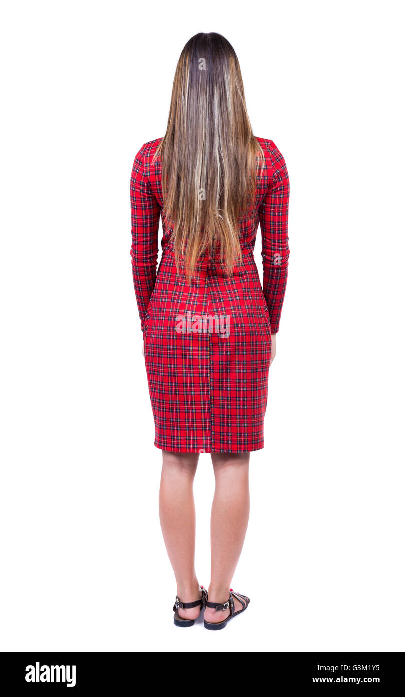 back view of standing young beautiful woman. girl watching. Rear view ...