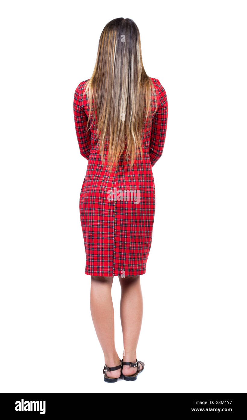back view of standing young beautiful woman. girl watching. Rear view ...