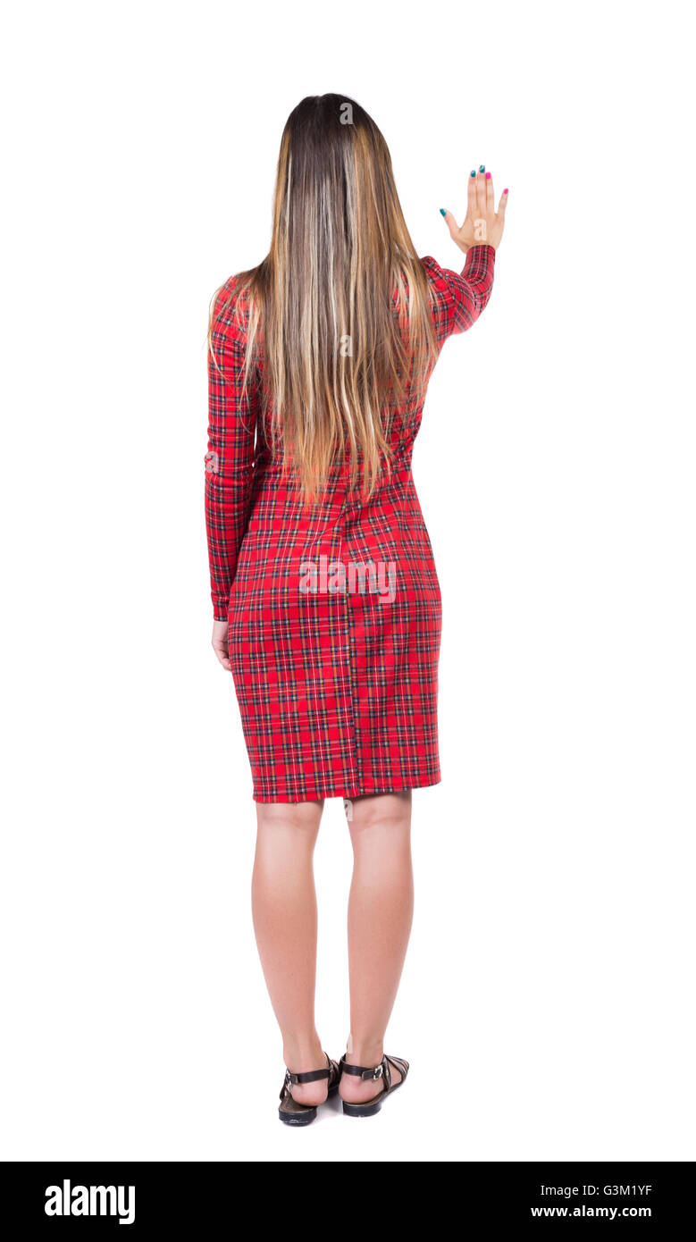 back view of young woman presses down on something. Isolated over white ...