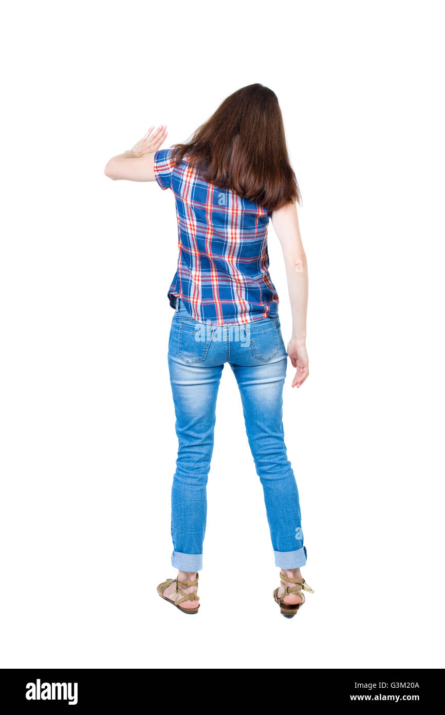 back view of young woman presses down on something. Isolated over white ...