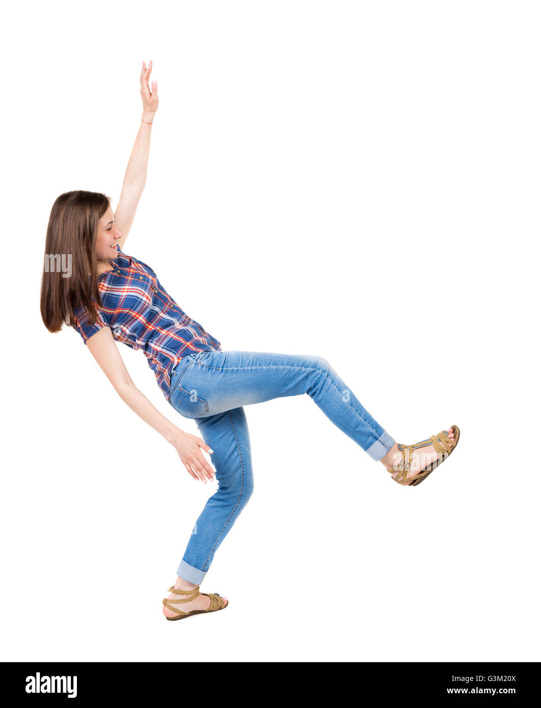 Balancing young woman. or dodge falling woman. Rear view people ...