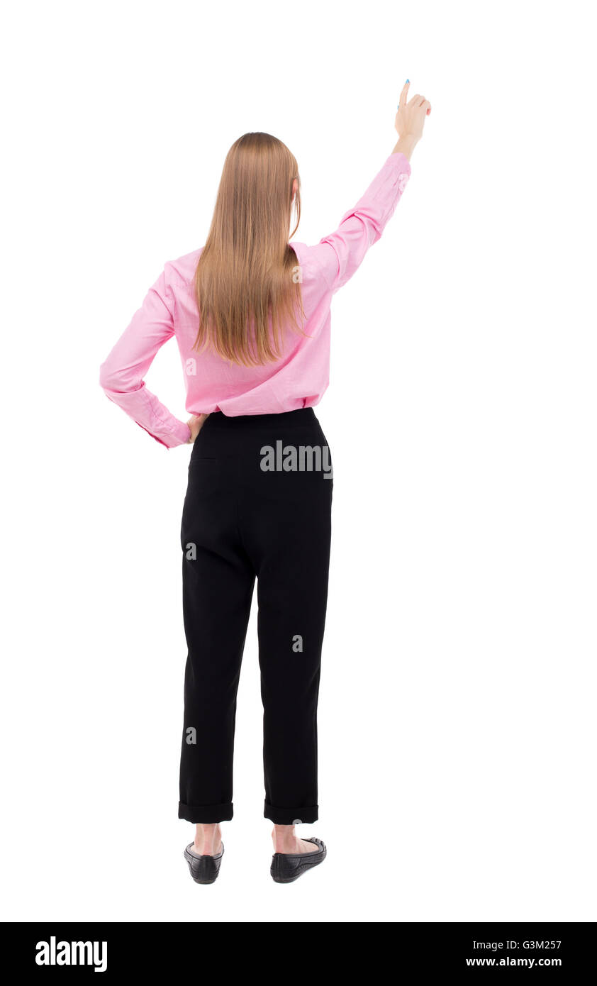 Back view of pointing woman. beautiful girl. Rear view people ...
