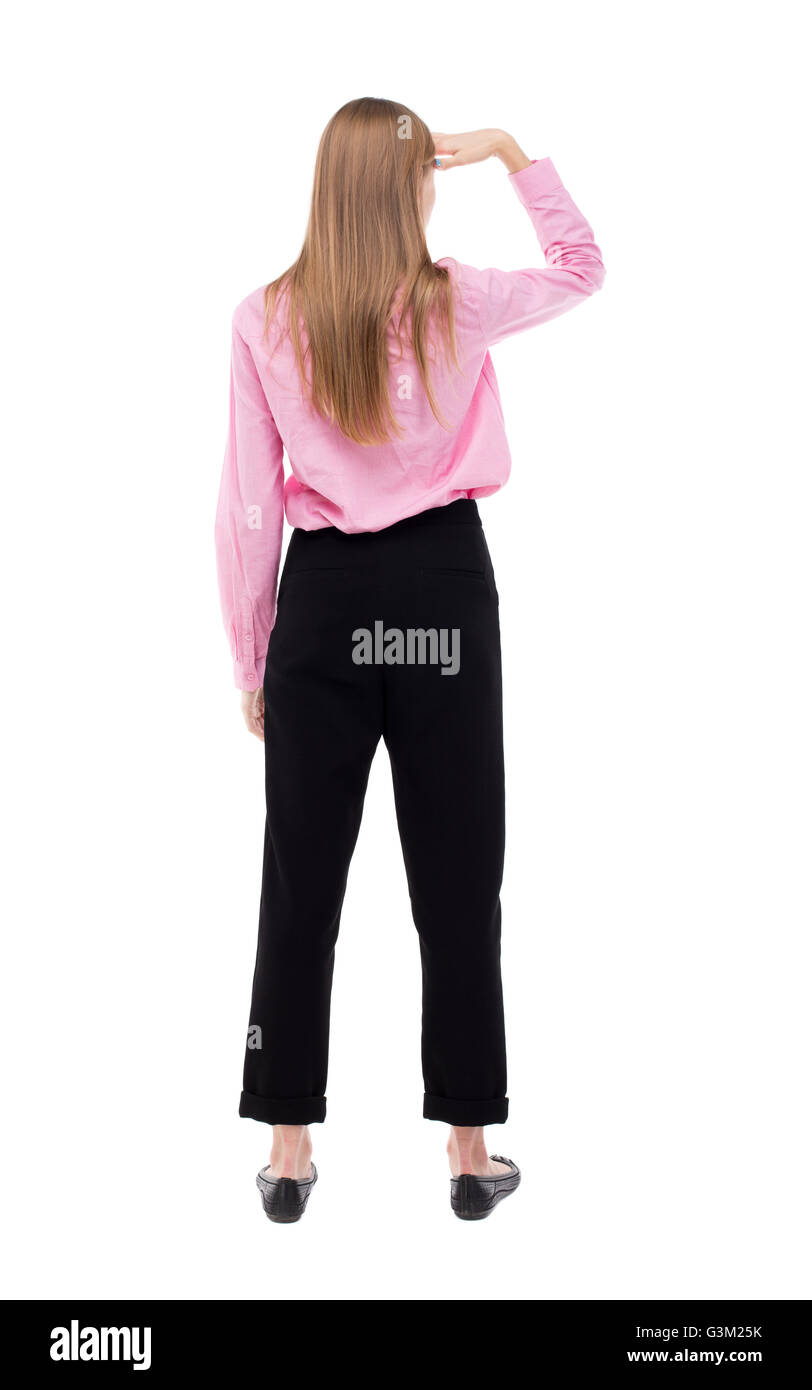 back view of standing young beautiful woman. girl watching. Rear view ...
