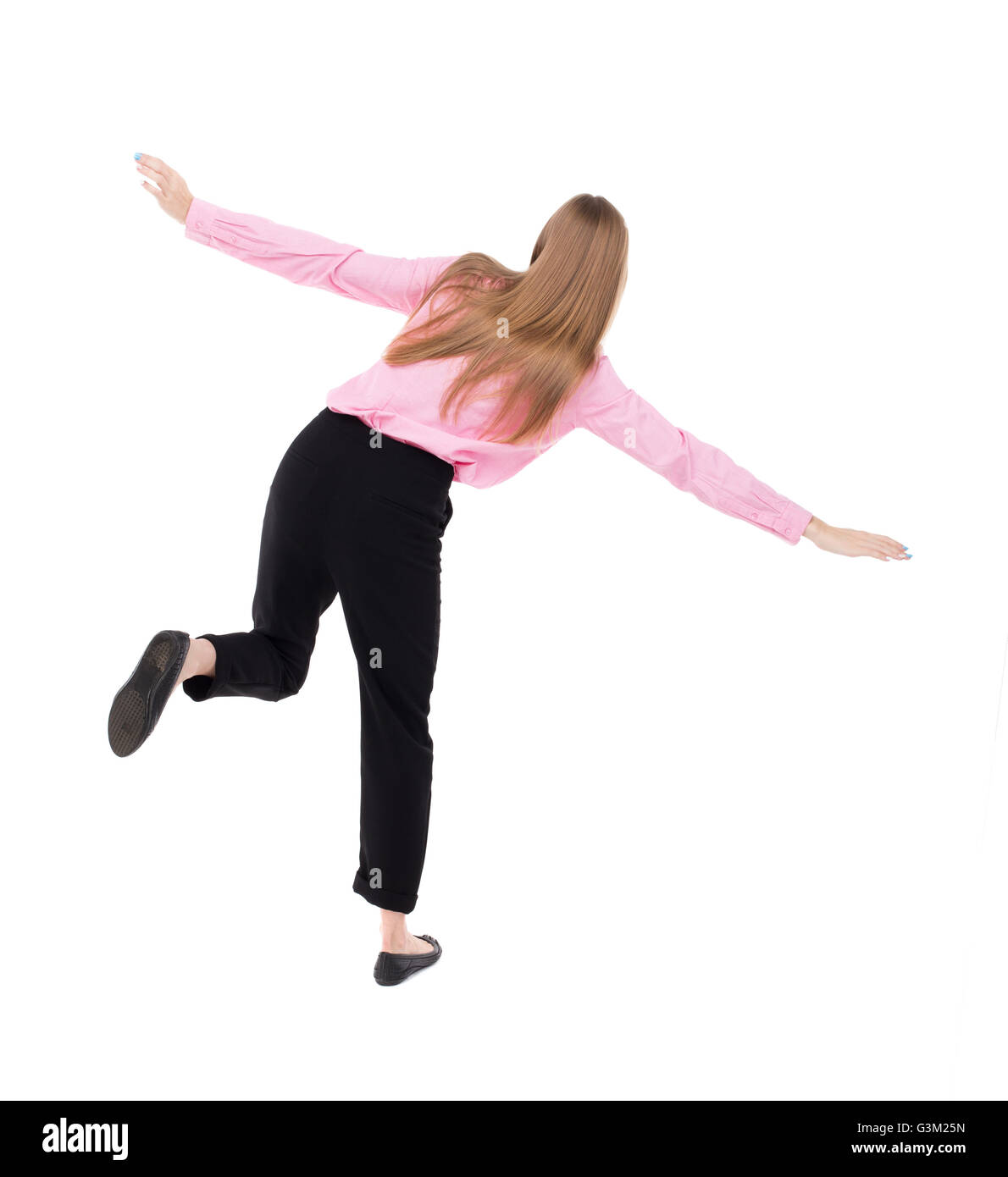 Balancing young business woman. or dodge falling woman. Rear view ...