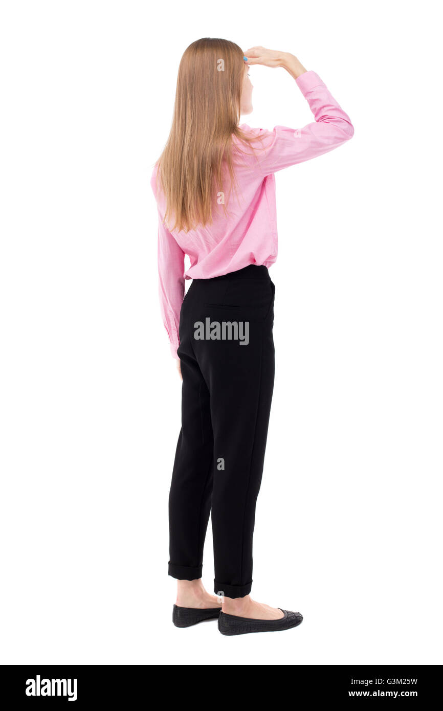 back view of standing young beautiful woman. girl watching. Rear view ...