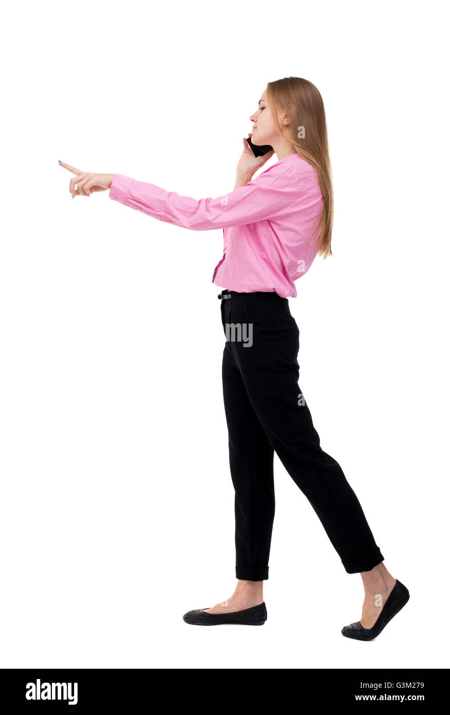 back view of walking business woman . beautiful girl going, pointing ...