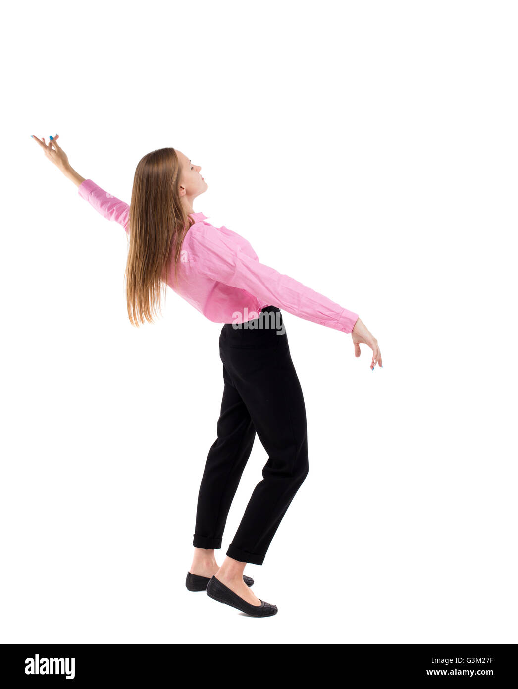 Balancing young business woman. or dodge falling woman. Rear view ...