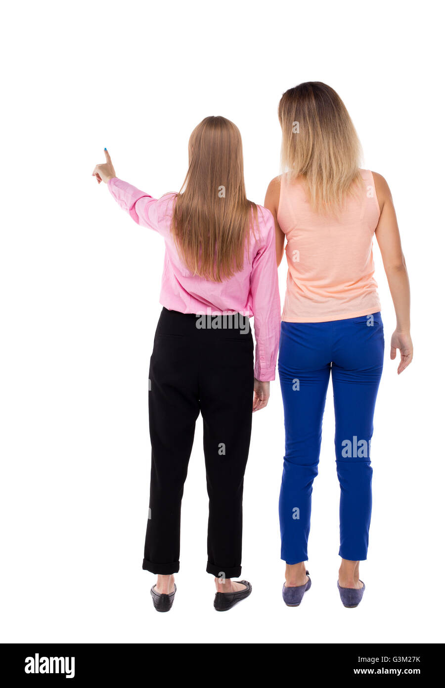 Back view of two pointing young girl. Rear view people collection ...