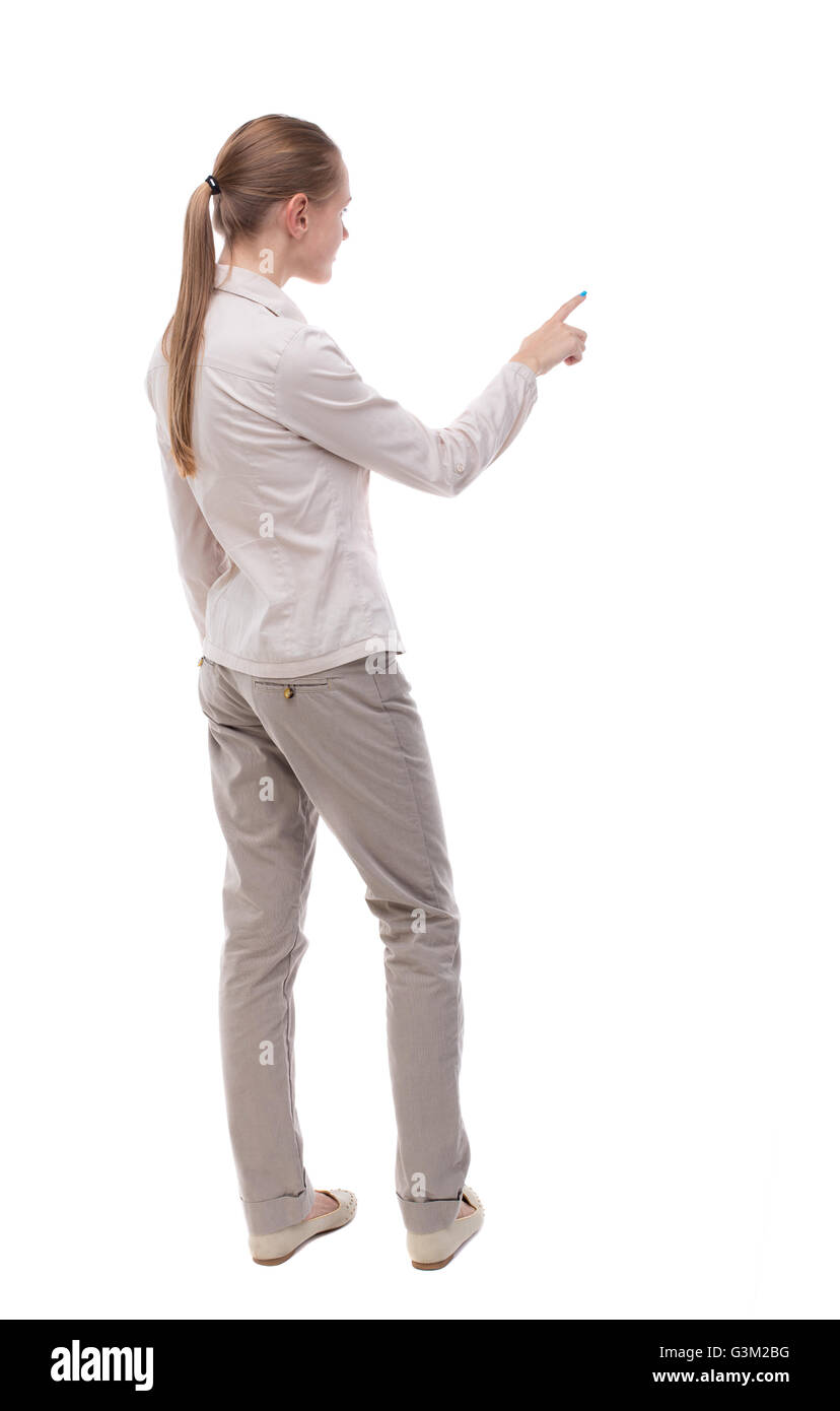 Back view of pointing woman. beautiful girl. Rear view people ...
