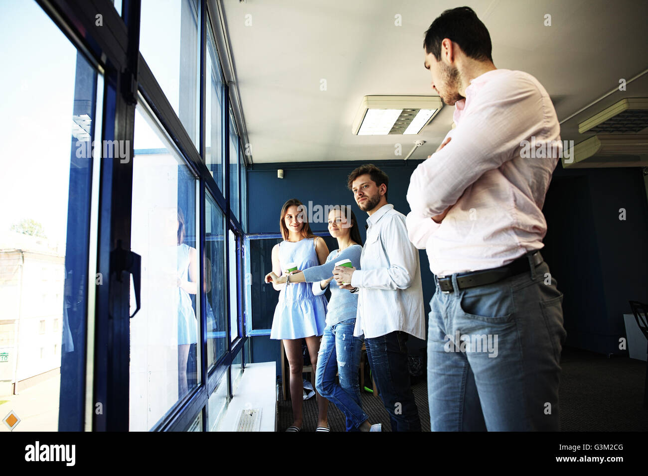 Portrait of a businessman looking at window Stock Photo - Alamy