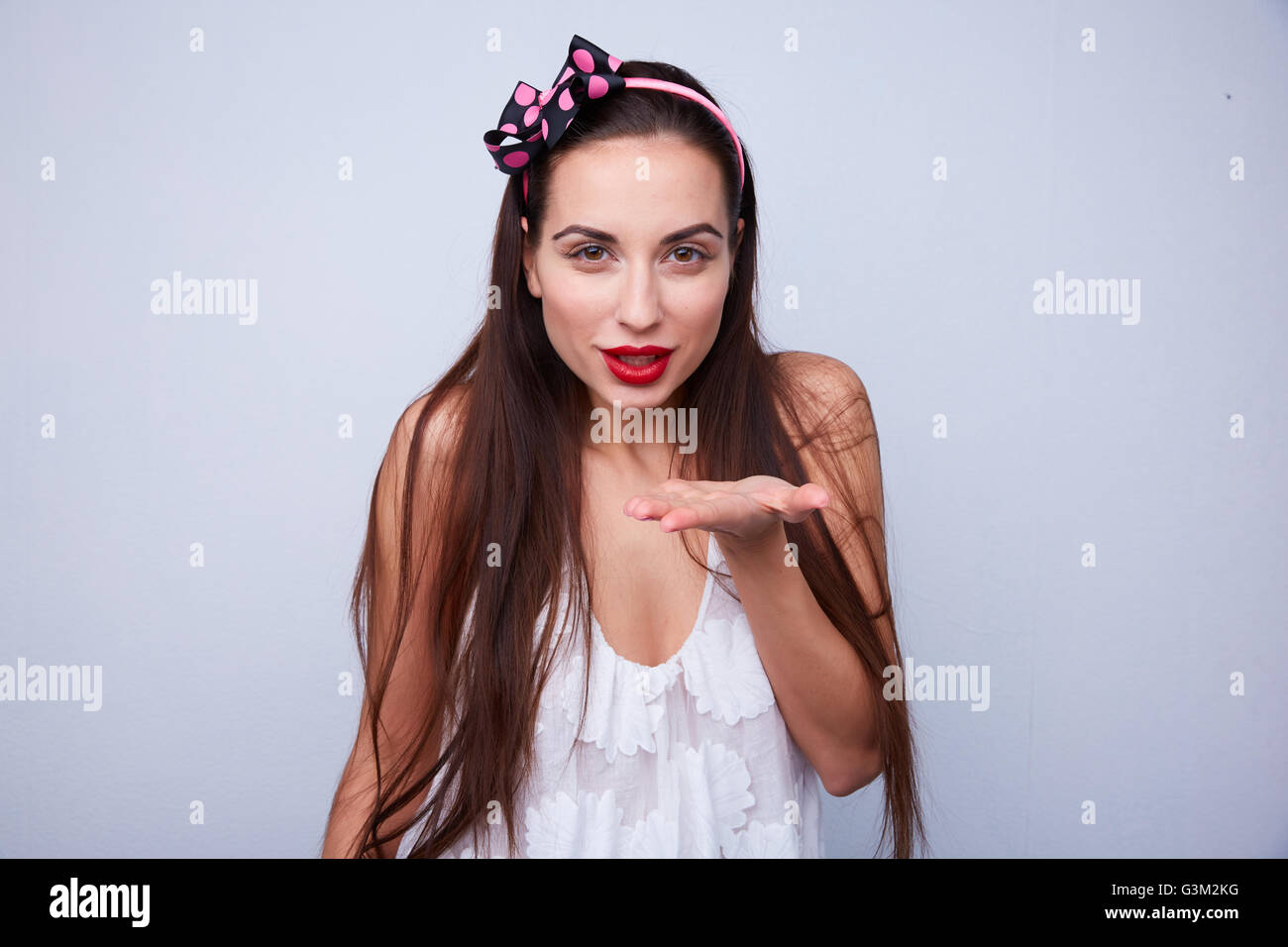 beautiful girl sends an air kiss Stock Photo - Alamy