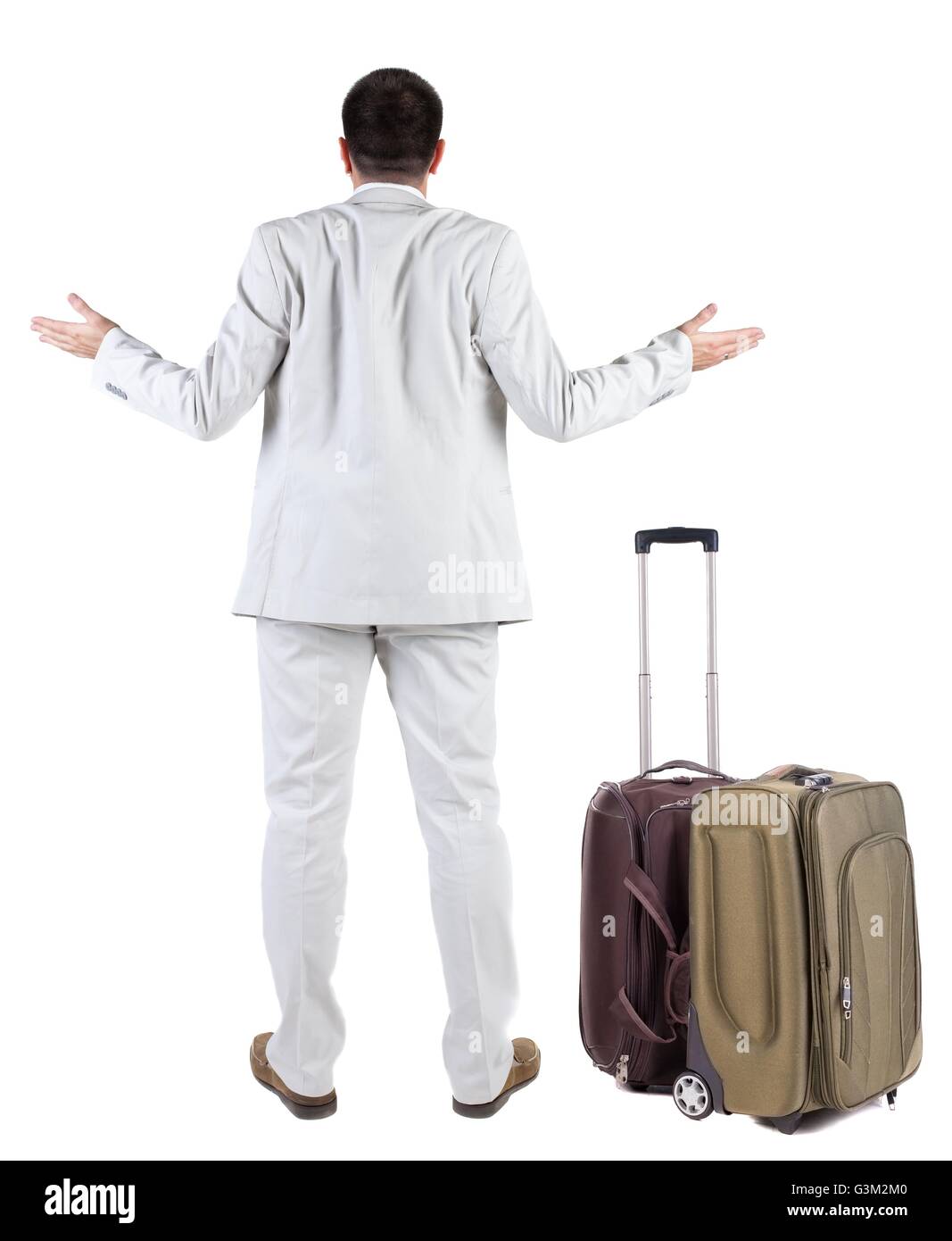 Back view of shocked business man with suitcase looking up. Rear view ...