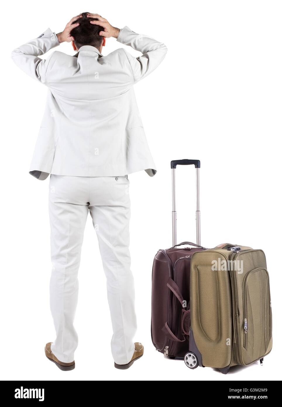 Back view of shocked business man with suitcase looking up. Rear view ...