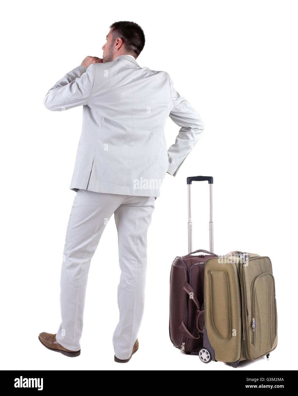 Back view of shocked business man with suitcase looking up. Rear view ...