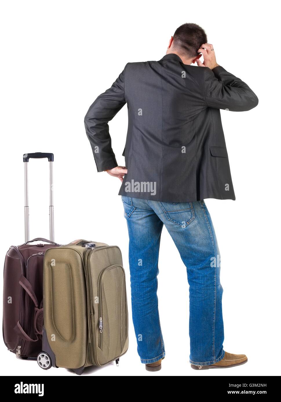 Back view of shocked business man with suitcase looking up. Rear view ...