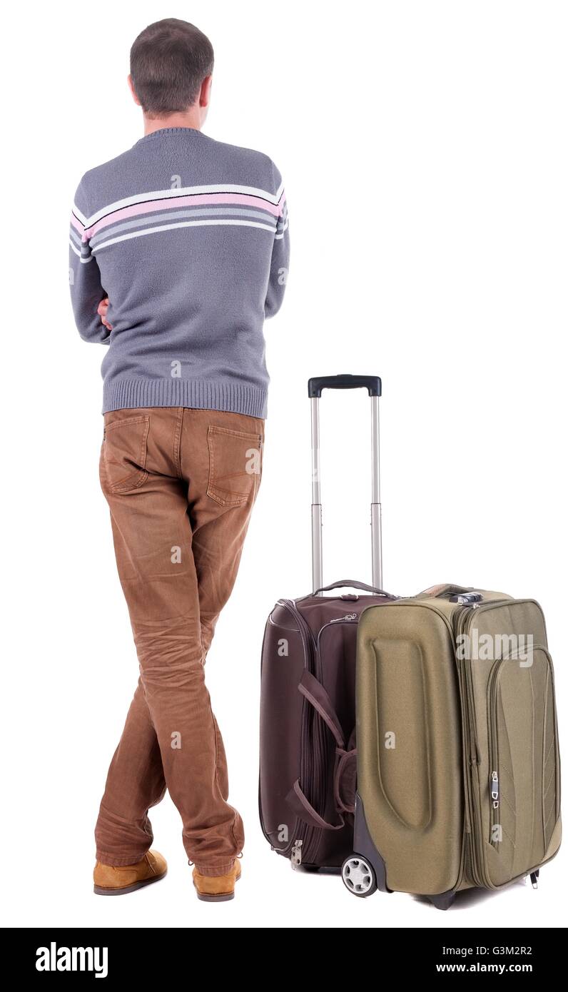 Back view of traveling man with suitcase looking up. Rear view people ...
