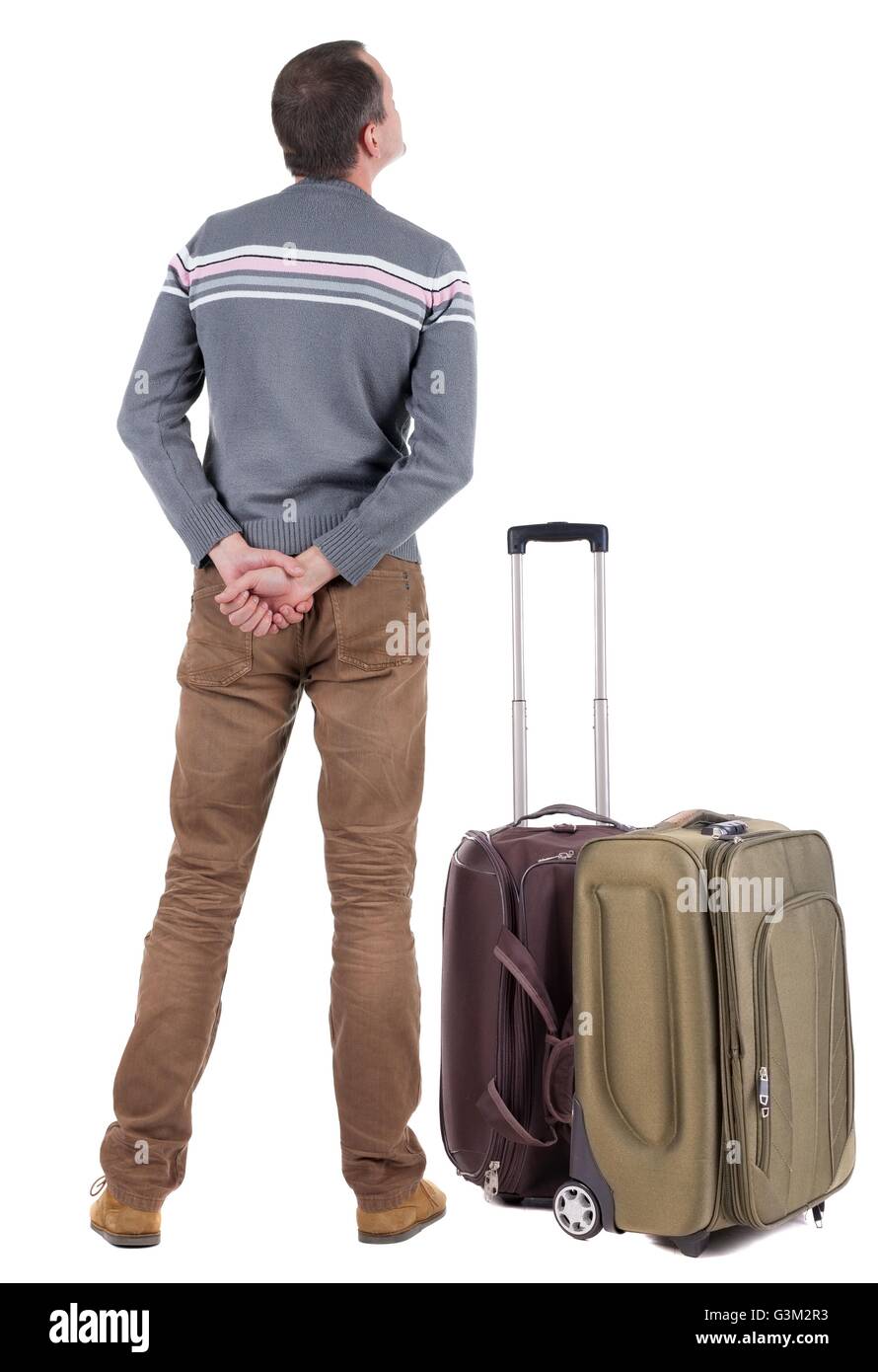 Back view of traveling man with suitcase looking up. Rear view people ...