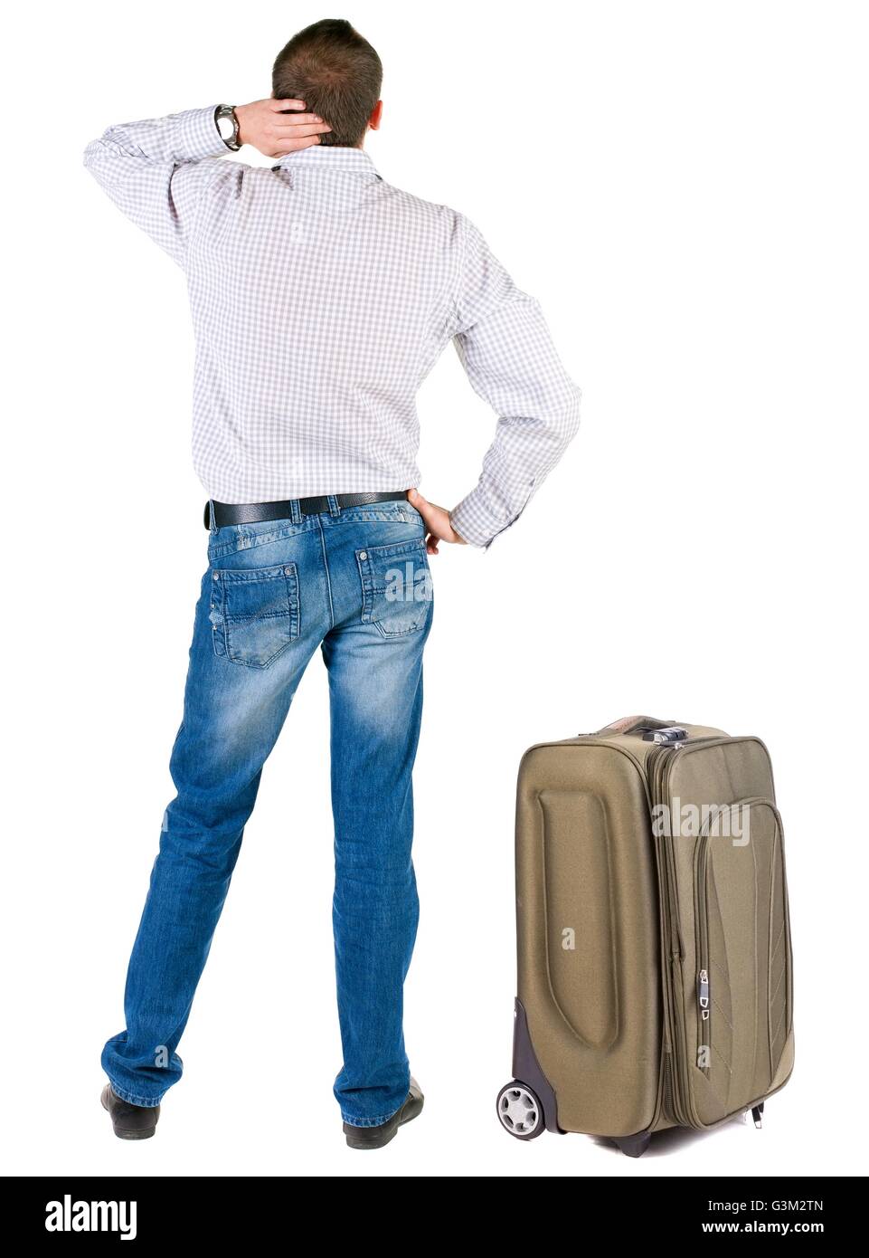 Back view of traveling busness man with suitcase looking up. Standing ...