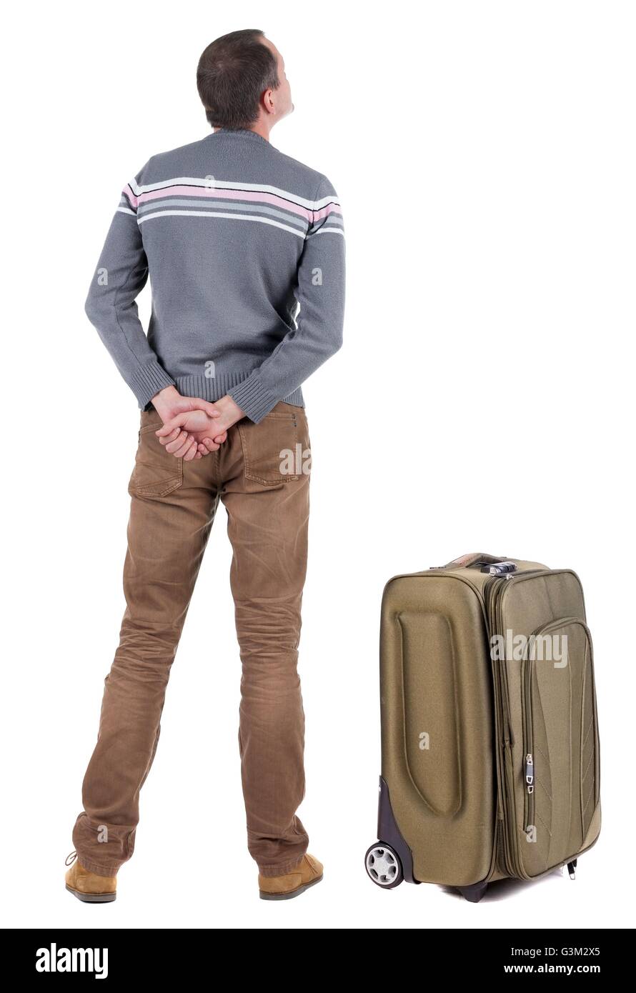 Back view of traveling man with suitcase looking up. Rear view people ...