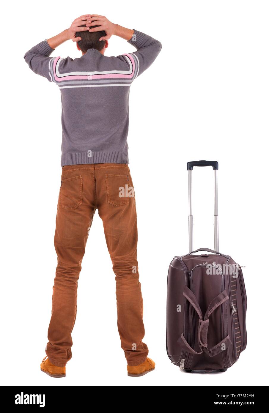 Back view of shocked business man with suitcase looking up. Rear view ...