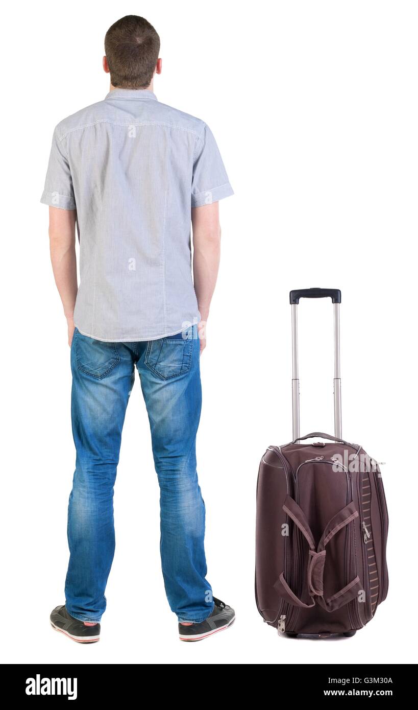 Back view of traveling man with suitcase looking up. Rear view people ...
