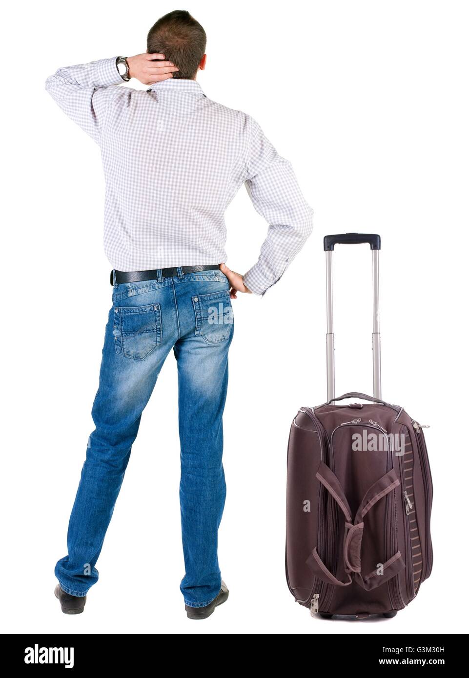 Back view of traveling busness man with suitcase looking up. Standing ...